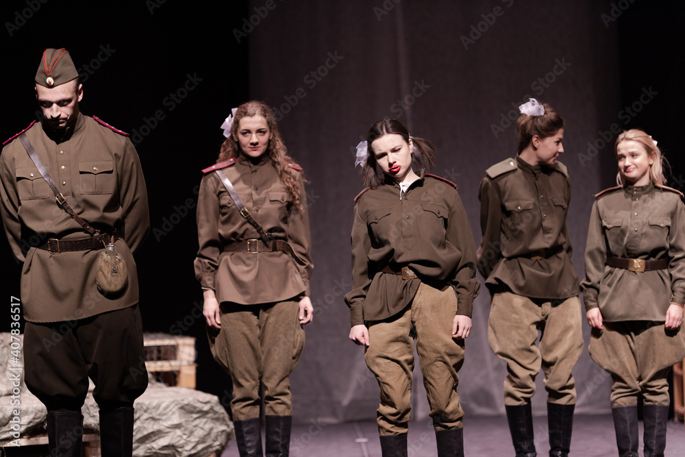 Actors in military uniforms of the Soviet army of World War II play a ...