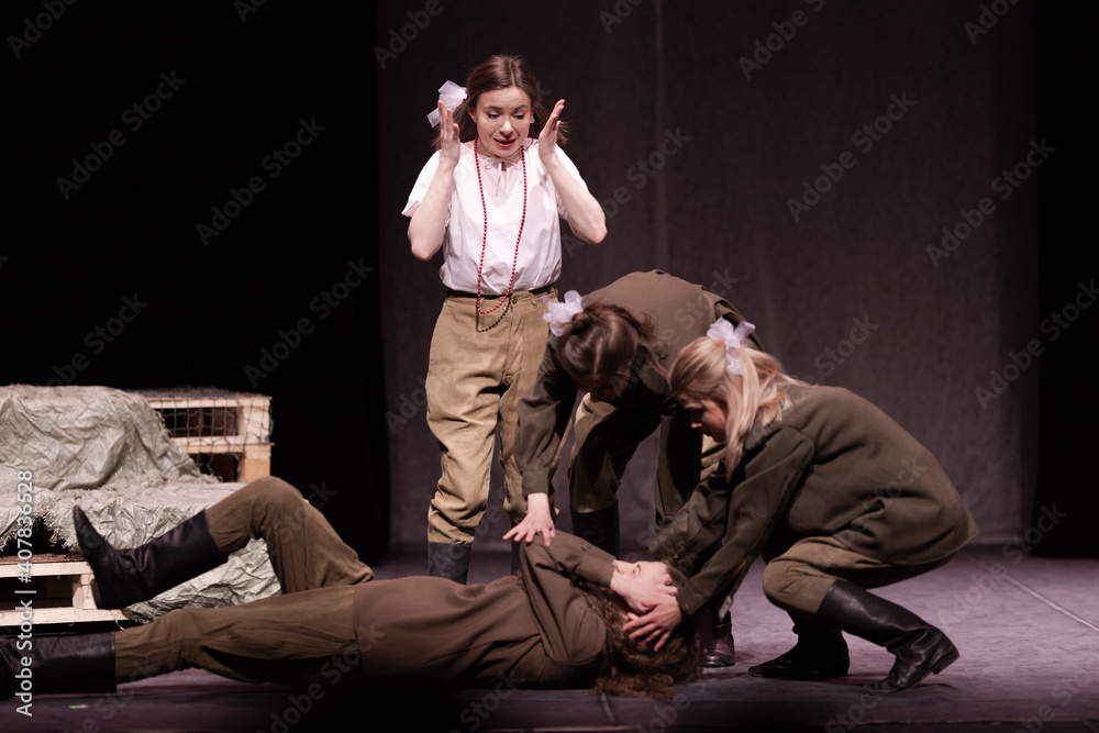 Actors in military uniforms of the Soviet army of World War II play a ...