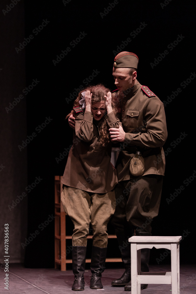 Actors in military uniforms of the Soviet army of World War II play a ...