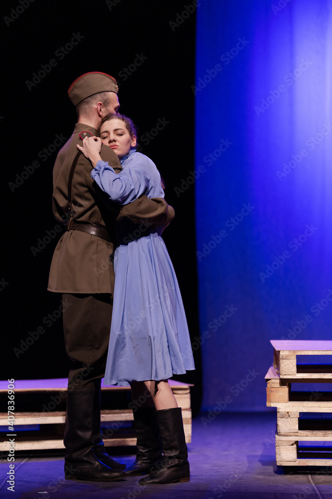 Actors in military uniforms of the Soviet army of World War II play a ...