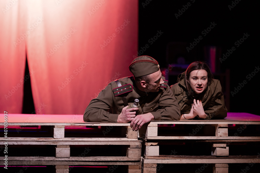 Actors in military uniforms of the Soviet army of World War II play a ...