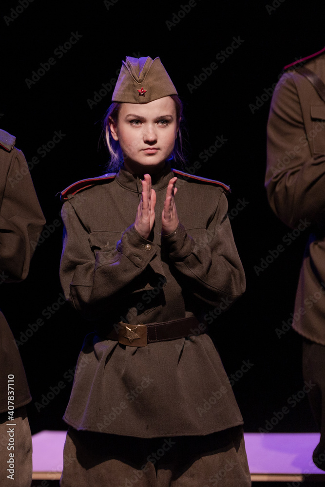 Actors in military uniforms of the Soviet army of World War II play a ...
