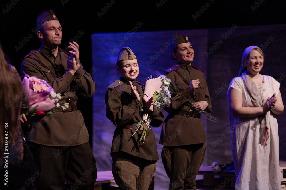 Actors in military uniforms of the Soviet army of World War II play a ...