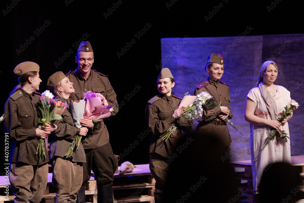 Actors in military uniforms of the Soviet army of World War II play a ...