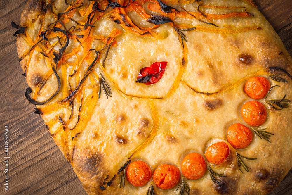 .Beautiful focaccia art after baking. Focaccia with a portrait of ...