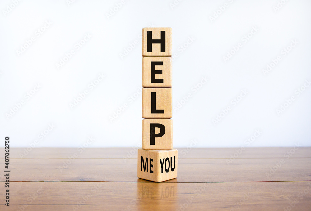 Help you or me symbol. Turned wooden cubes and changed words help me to ...