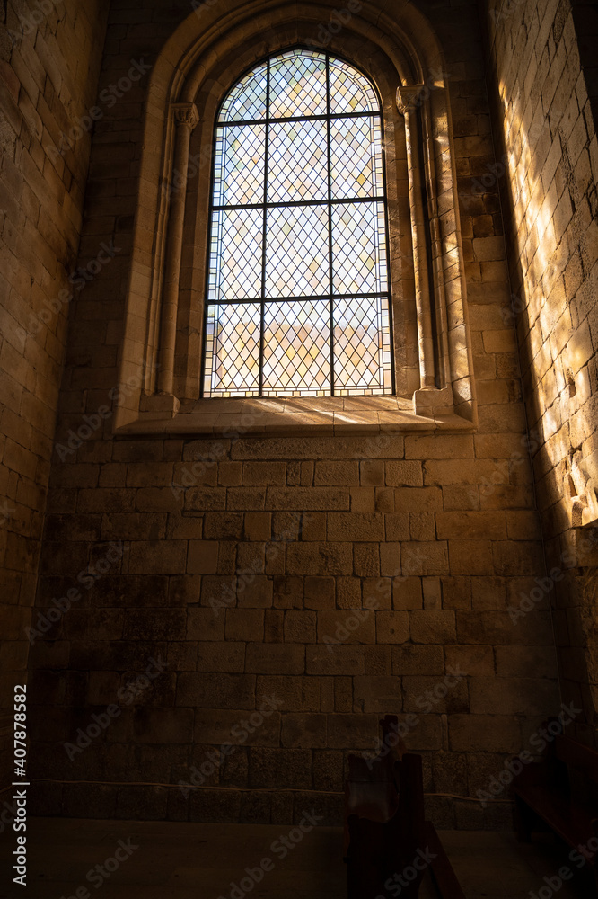Bright window, with beautiful details. Interior of a medieval building ...