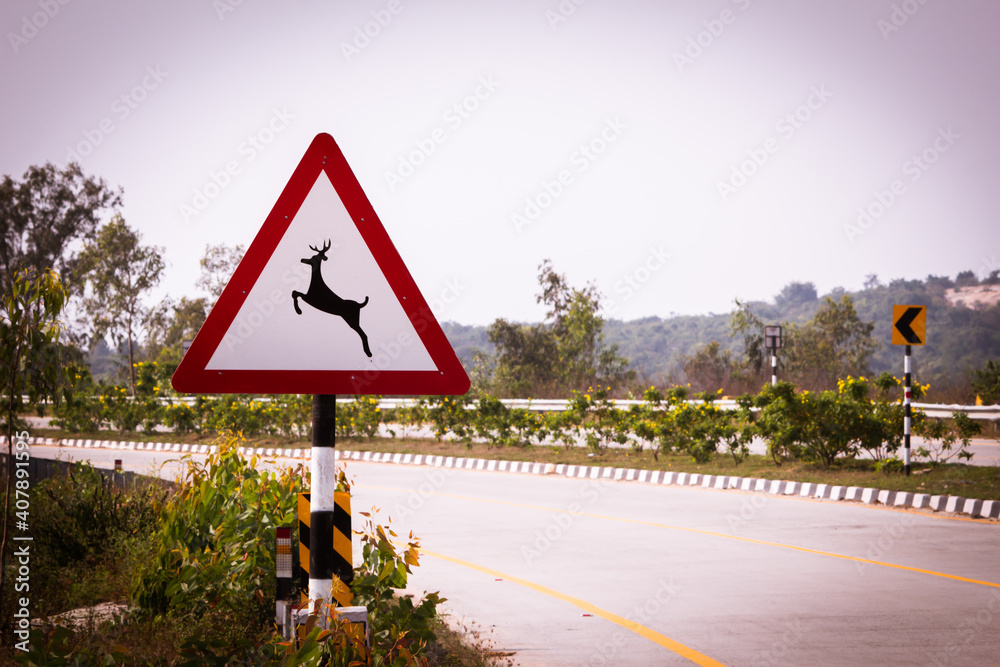 Indian road sign indicating deer crossing. Sign indicating to watch out ...