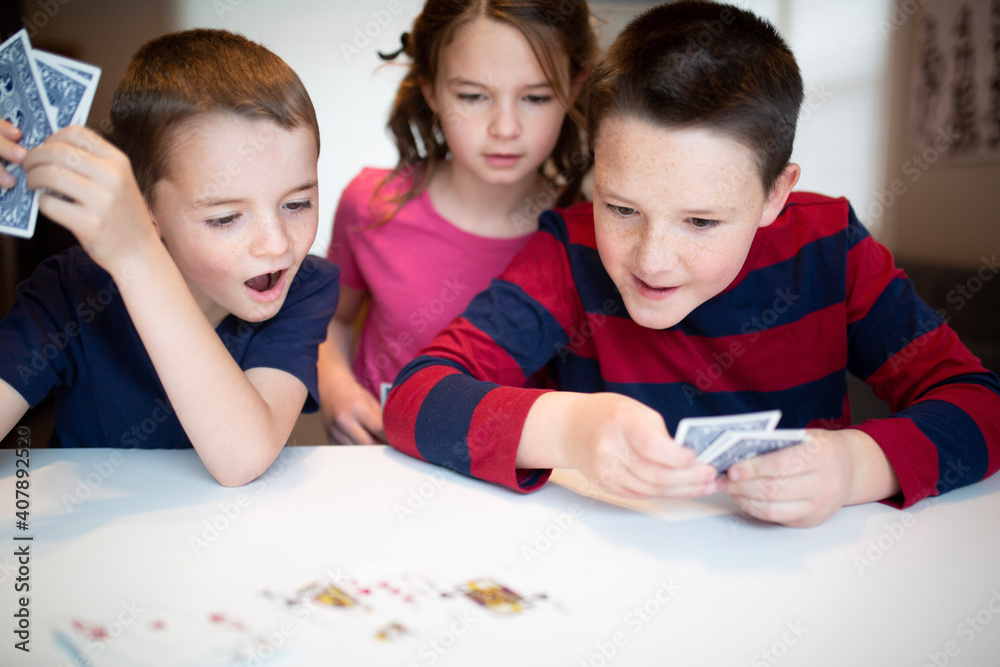 kids playing cards Stock Photo | Adobe Stock