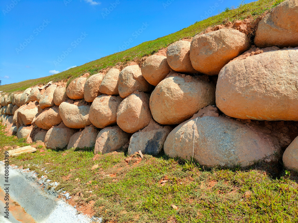 Natural Boulders On Slopes