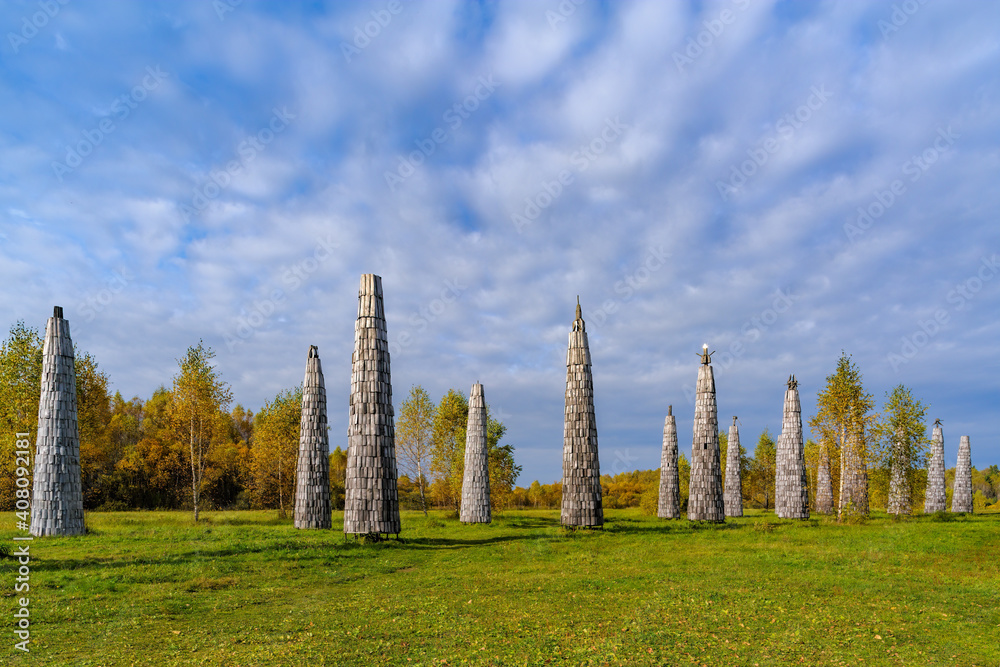 Double colonnade of 42 steampunk wooden missiles leading up to The ...