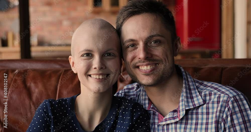 Head shot close up portrait loving couple, husband and young hairless ...