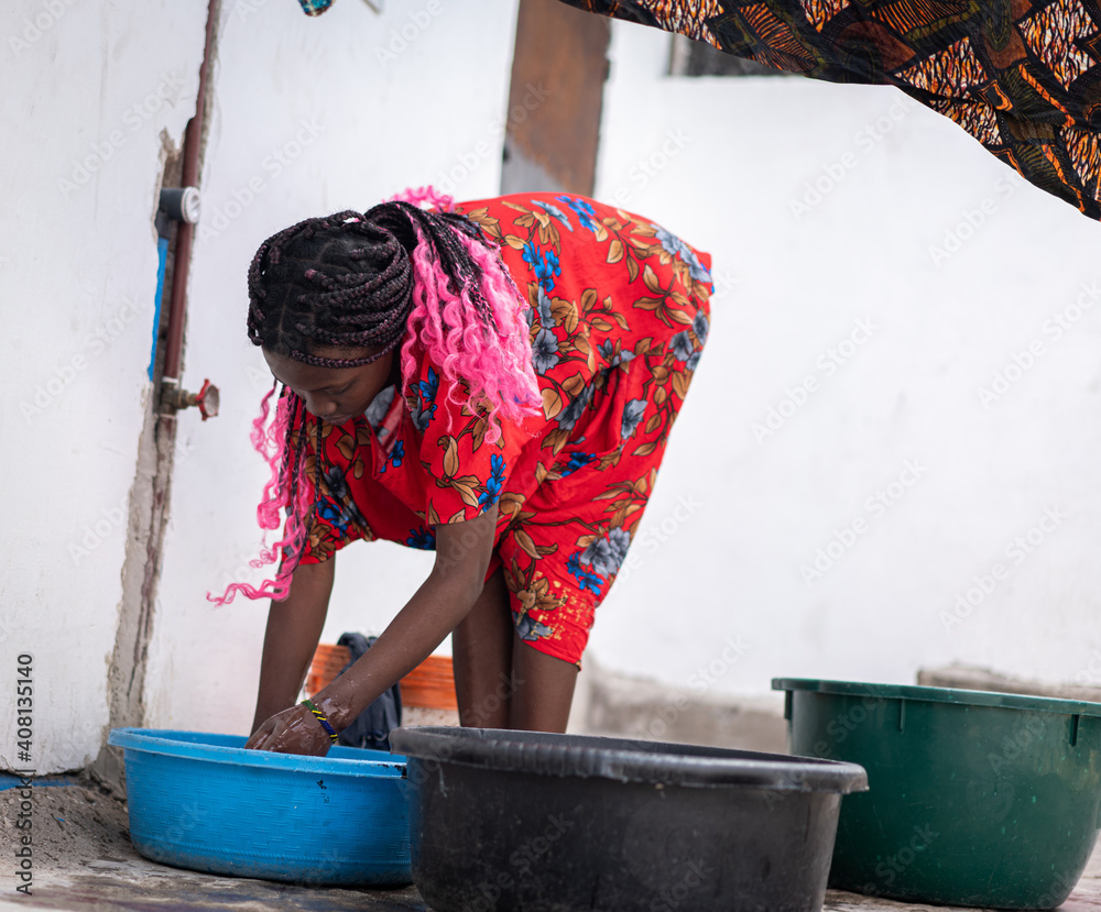Woman Washing Clothes By Hand