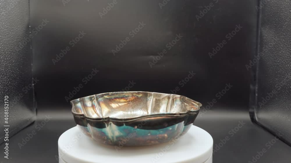 Rusty silver bowl of antique design from flee market with rusty surface ...