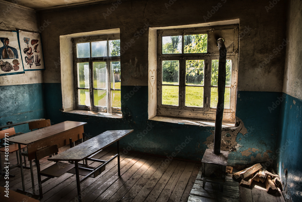 Old and abandoned school classroom interior, in black and white. Stock ...