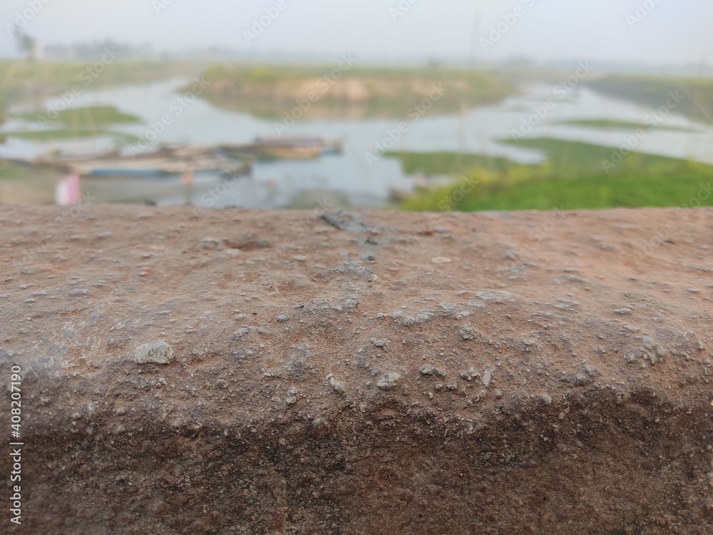 bd river.Waterfall into foamy river.Aerial view of river. texture ...