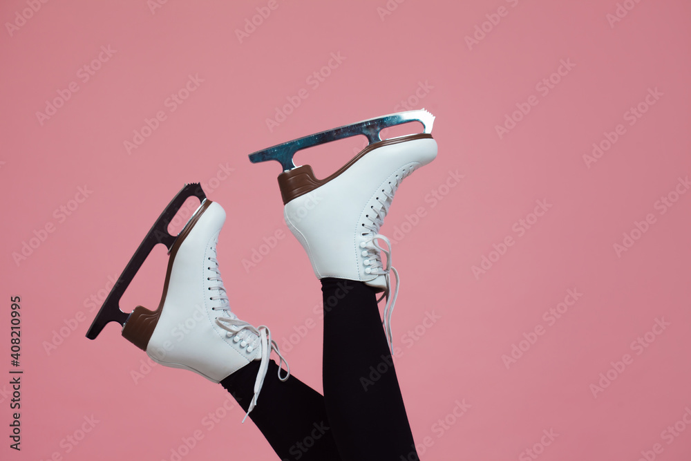 Figure skating is a winter sport and leisure. Women's feet in ice ...