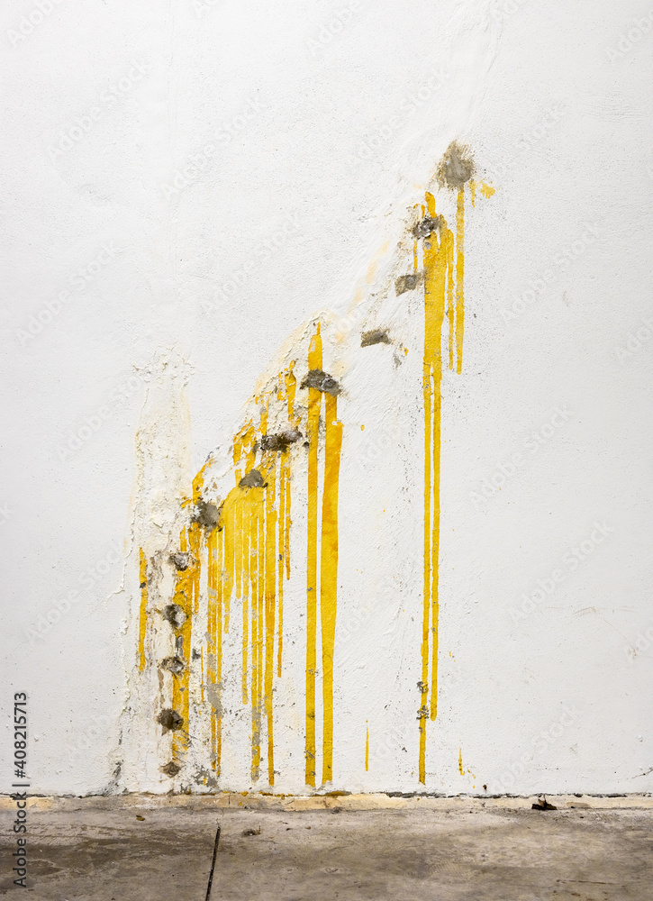 Stockfoto Multiple diagonal yellow epoxy injections to repair or stop ...