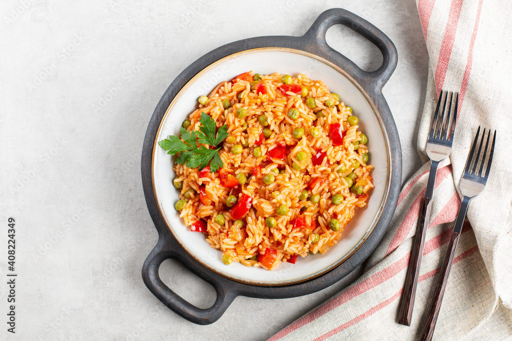 Djuvec rice - traditional balkan dish. Rice cooked with red bell pepper ...