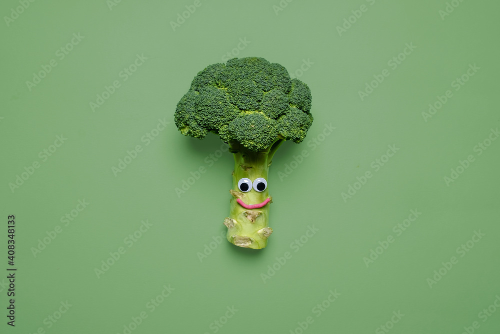 Happy and smiling broccoli with googly eyes and mouth on a matching ...
