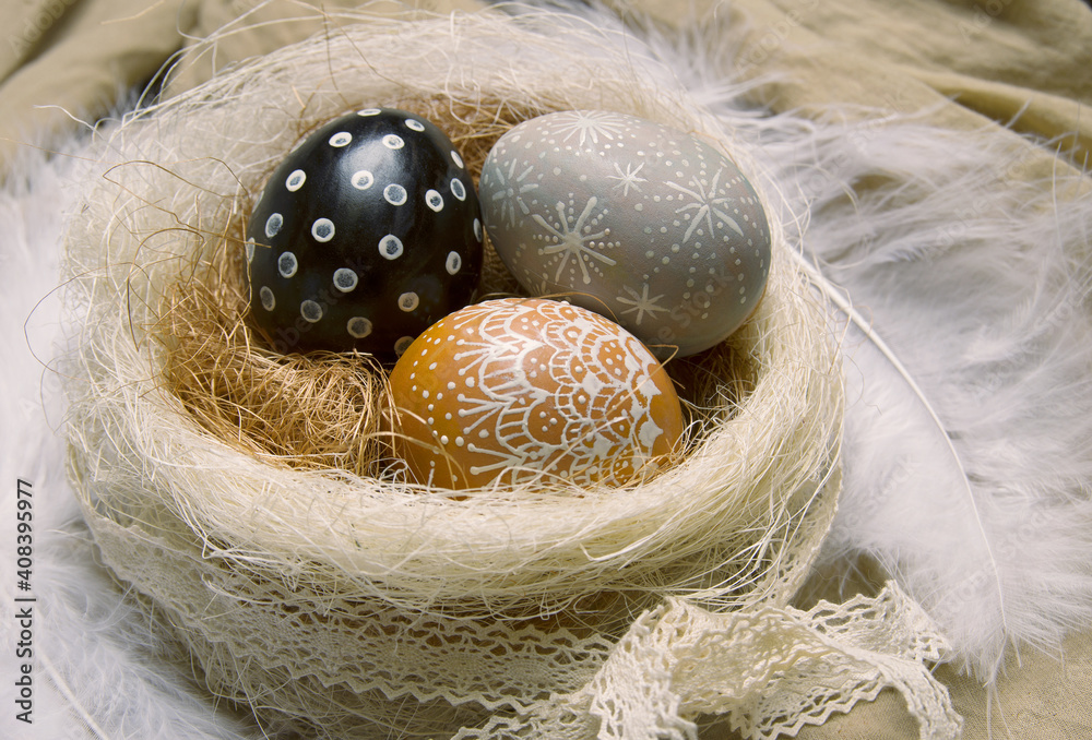 Ostara symbols. Colorized eggs in a nest. Stock Photo | Adobe Stock