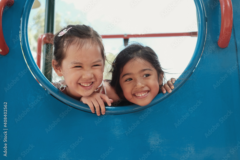 multicultural kids having fun at playground Stock Photo | Adobe Stock