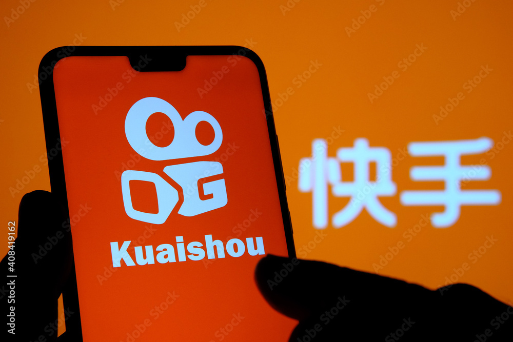 Kuaishou app logo seen on the smartphone screen and blurred background ...