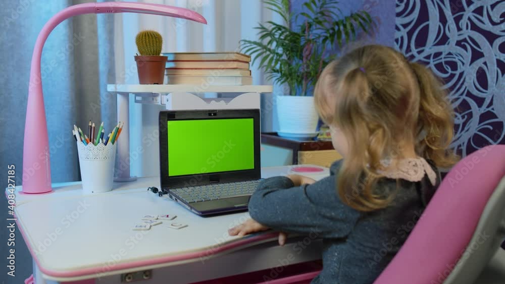 Preschool child girl distance online learning at home. Cute kid ...