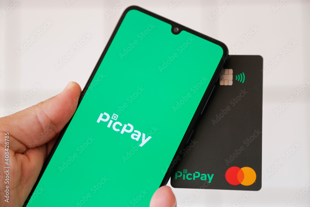 Foto de PicPay logo on mobile cell phone screen and credit card ...