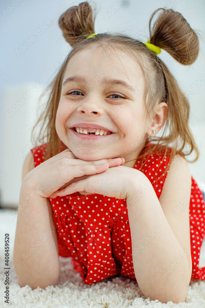 Little girl has no tooth. the child has lost a baby tooth. High quality ...