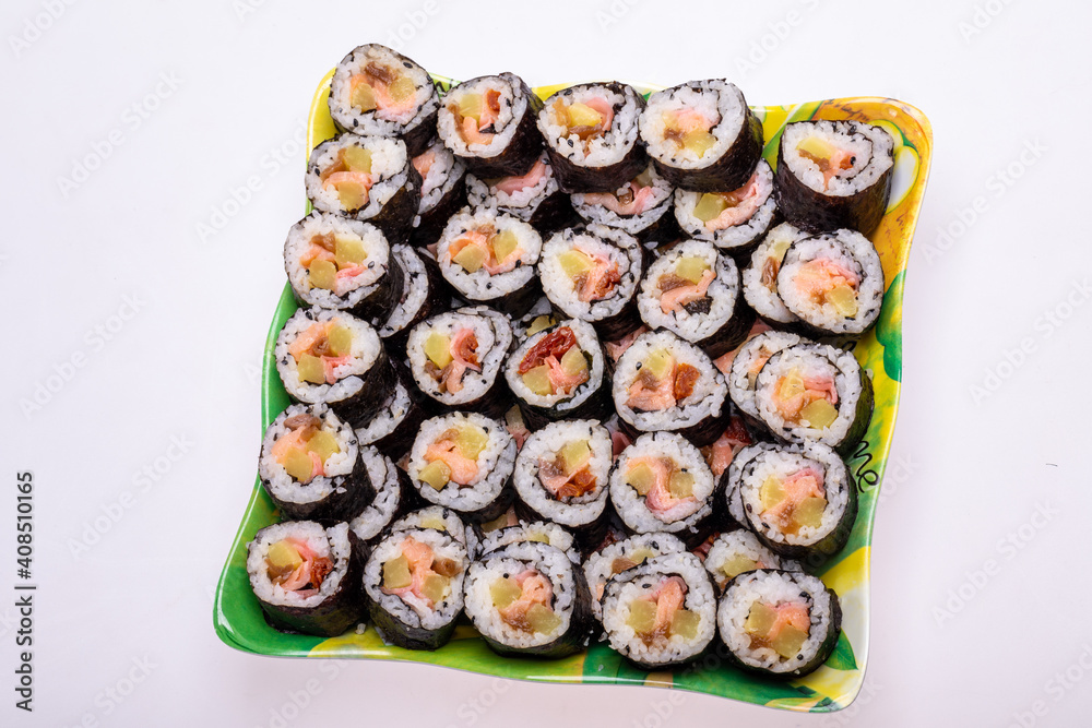 Top view of stack of Japanese sushi maki roll plate. Served in Japanese ...