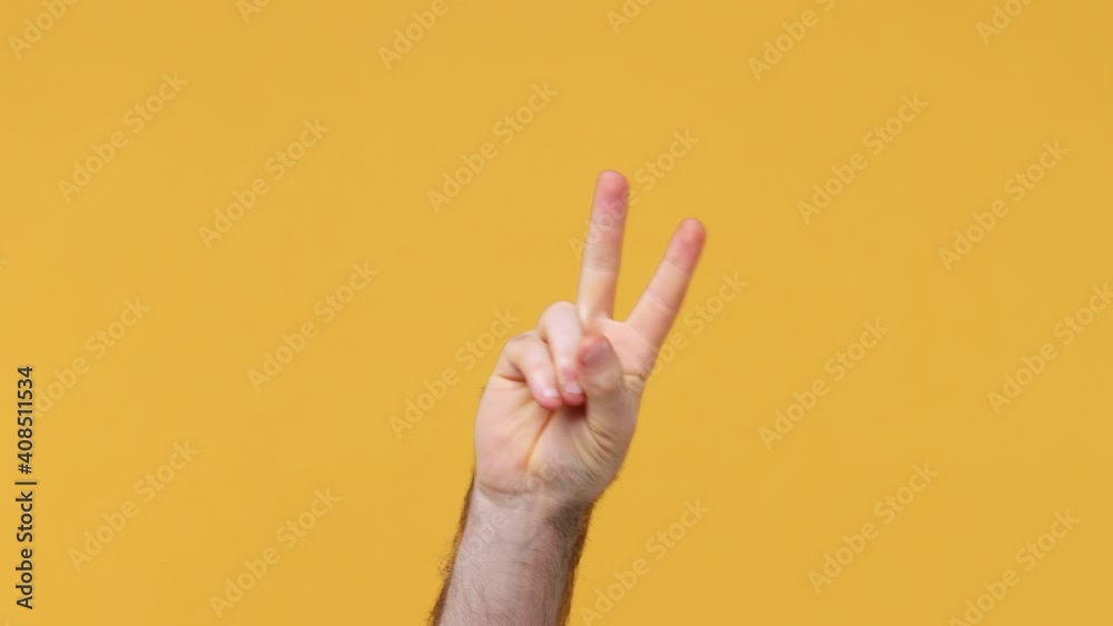 Cropped close up man male hand showing v-sign victory fingers thumbs up ...