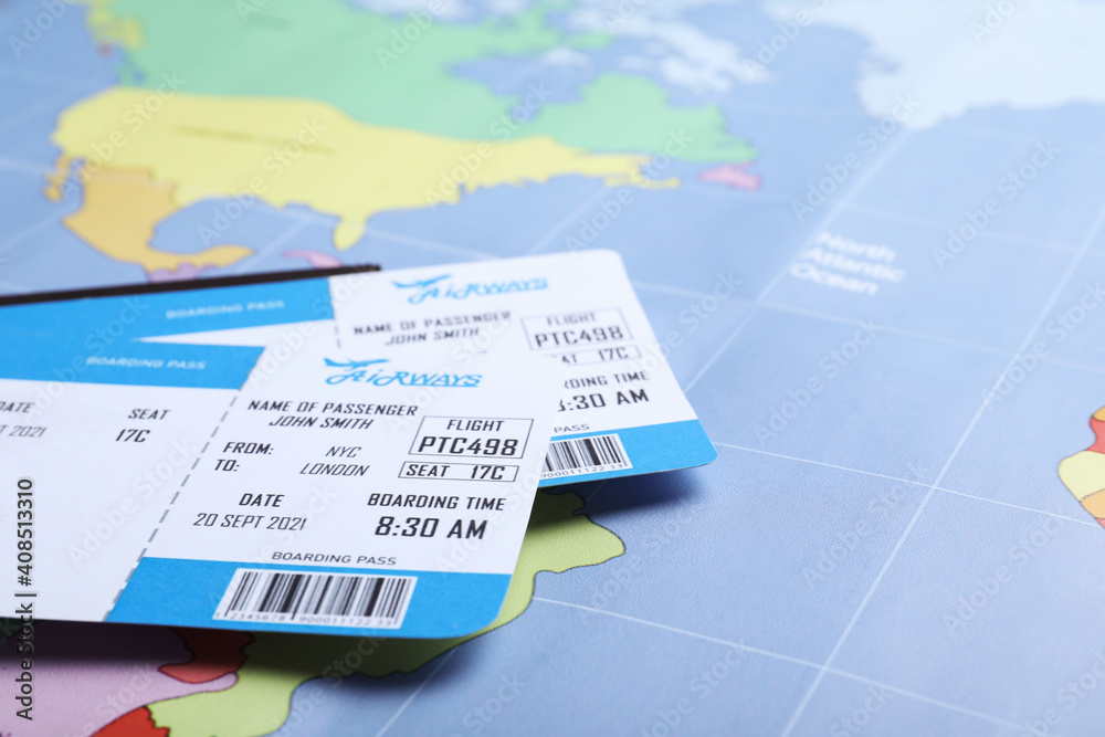 Tickets on world map, closeup. Travel agency concept Stock Photo ...