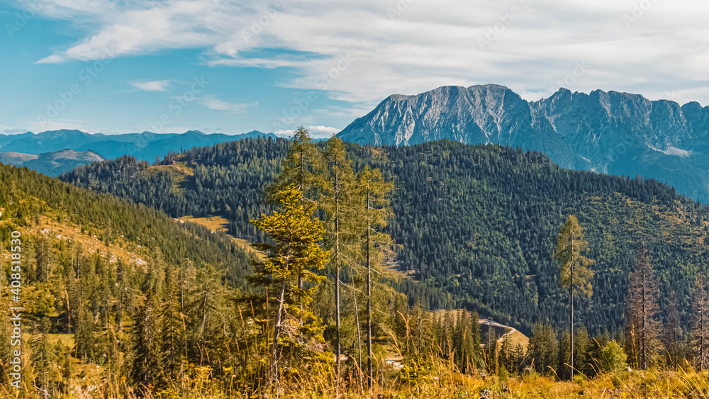 Beautiful alpine summer view with a far view of the Grimming mountain ...