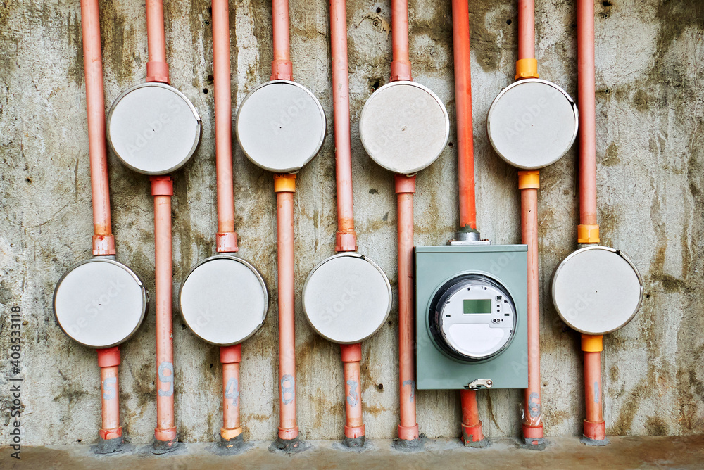 Abstract detail background view of a round electrical meter, surrounded ...