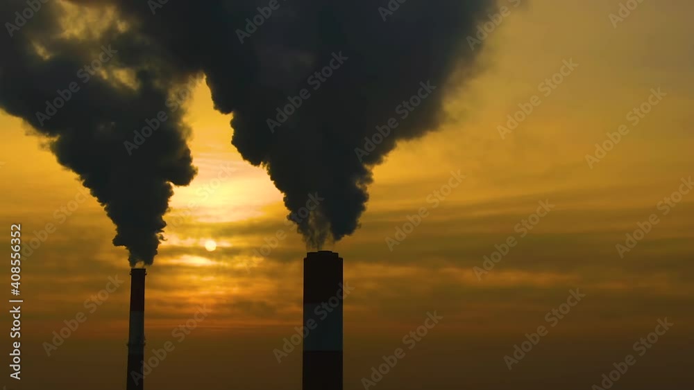 Air pollution. clouds of smoke coming from the chimneys of the plant ...