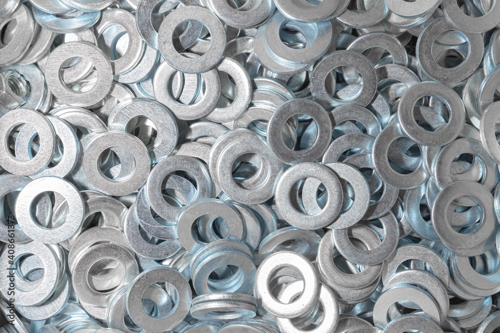 Washers for the bolt. Texture. Many washers for bolts and screws ...