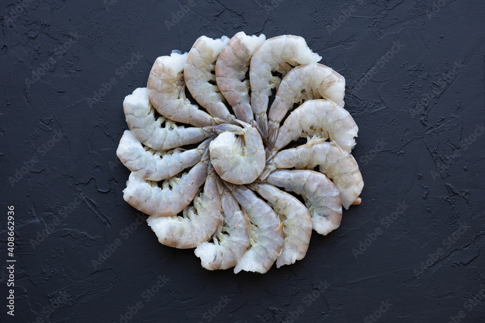 Fresh Vannamei shrimps without head for meal preparation. Raw uncooked ...