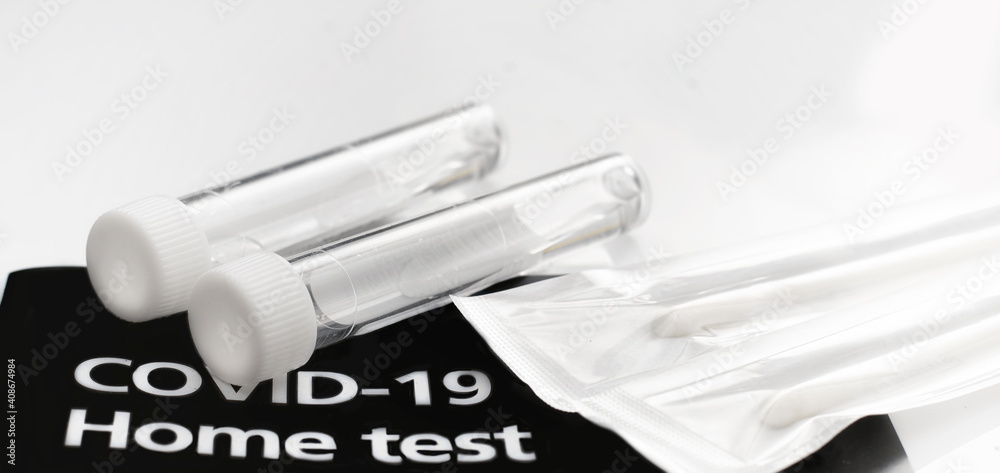 Covid-19 home testing kit on a plain with a guide Stock Photo | Adobe Stock