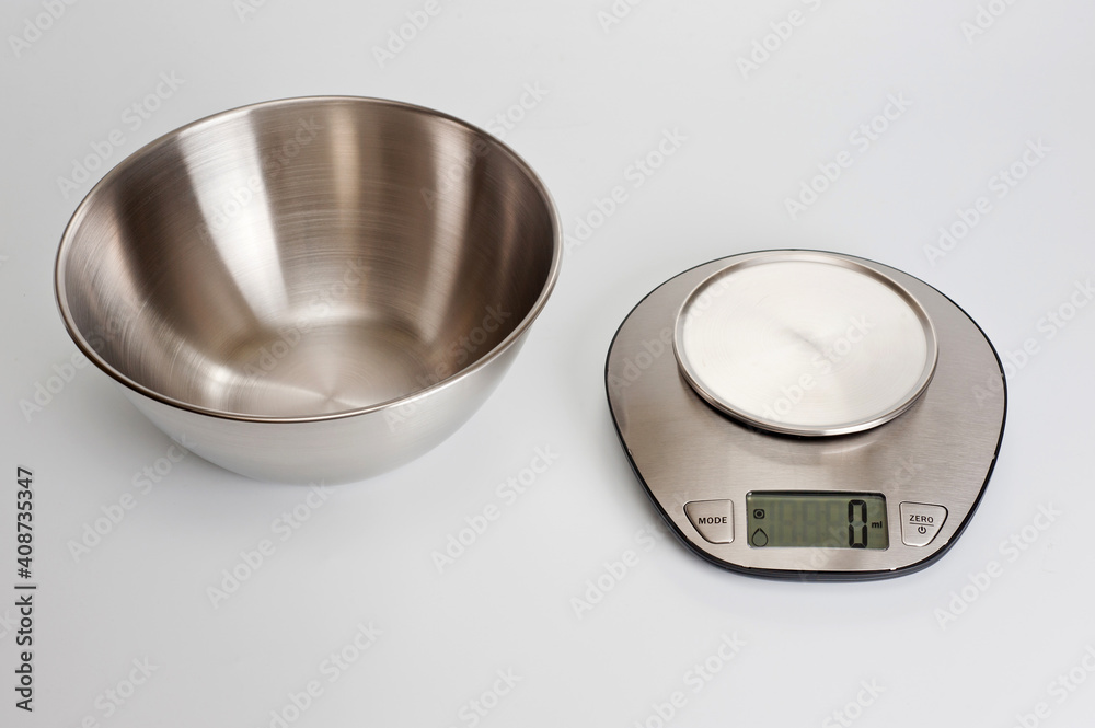 Scales kitchen desktop metal electronic with a metal bowl. Background ...