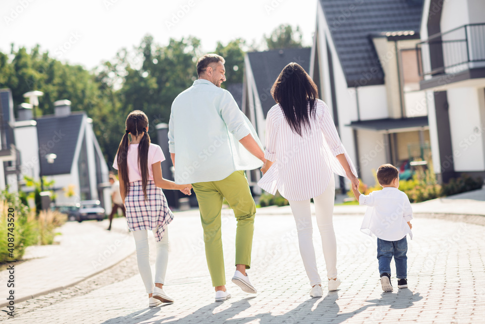 Rear back behind full length body size view of nice adorable friends ...