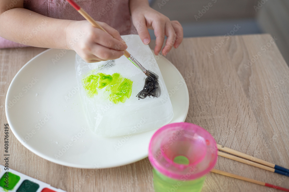 Child painting ice block, fantastic chilly sensory activity and art for ...