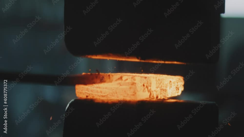 blacksmith power hammer hitting hot smelted metal Stock Video | Adobe Stock
