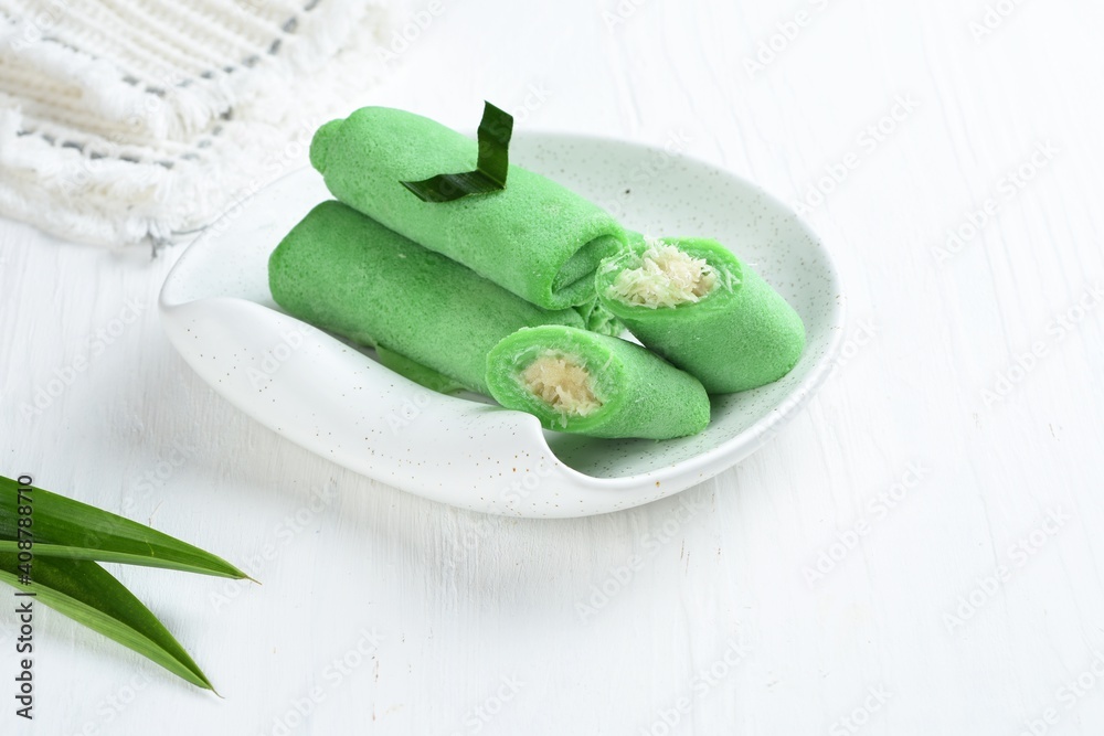 dadar gulung or ketayap is an traditional sweet snack ,popular in ...