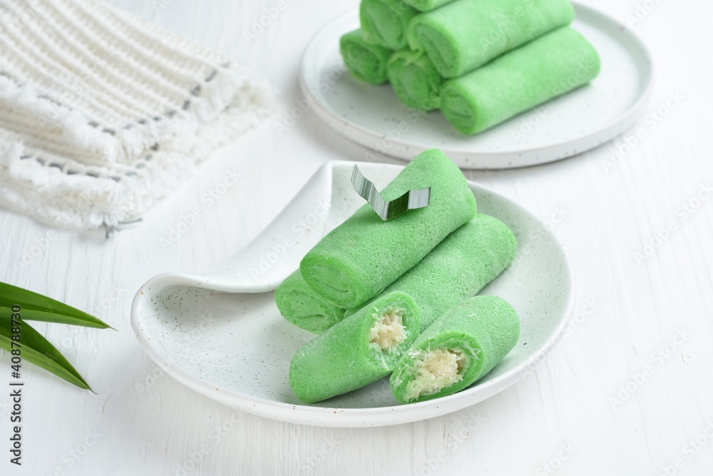dadar gulung or ketayap is an traditional sweet snack ,popular in ...