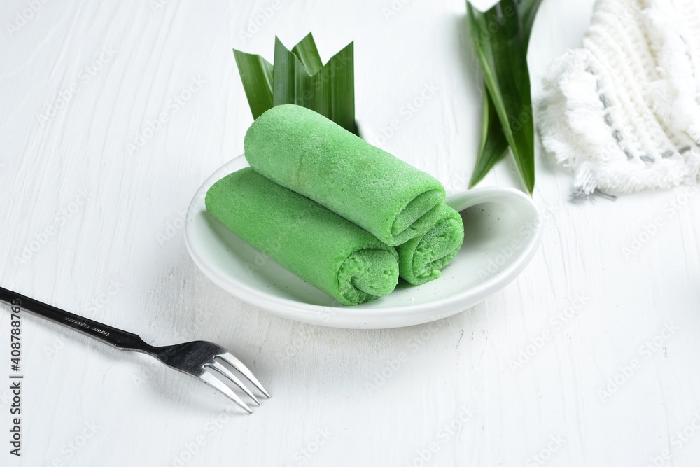 dadar gulung or ketayap is an traditional sweet snack ,popular in ...