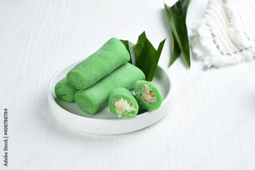 dadar gulung or ketayap is an traditional sweet snack ,popular in ...
