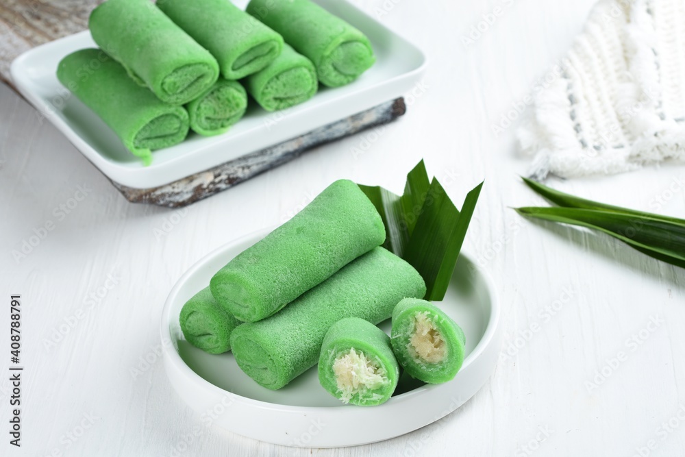 dadar gulung or ketayap is an traditional sweet snack ,popular in ...