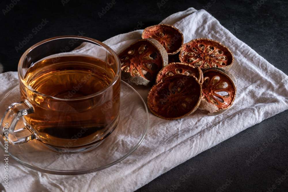 Hot bael fruit tea in a clear cup with hot steam Bael Fruit Tea made ...