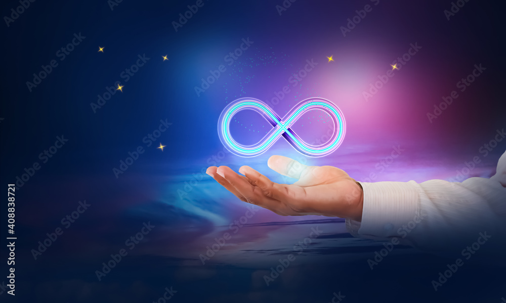 DevOps concept, an IT engineer holding the glowing devops symbol on ...